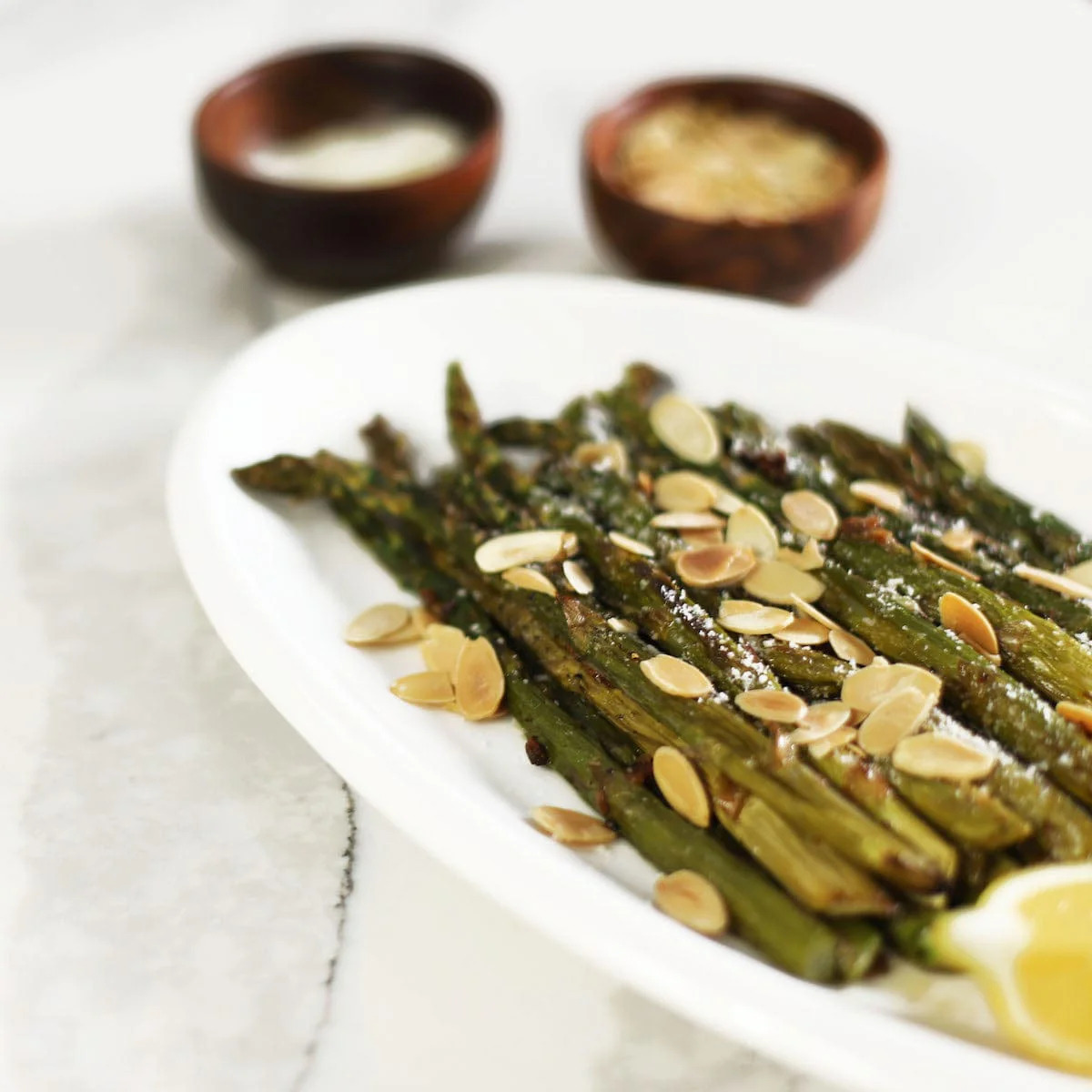 Recipe: Roasted asparagus with parmesan and bassé sliced almonds ...